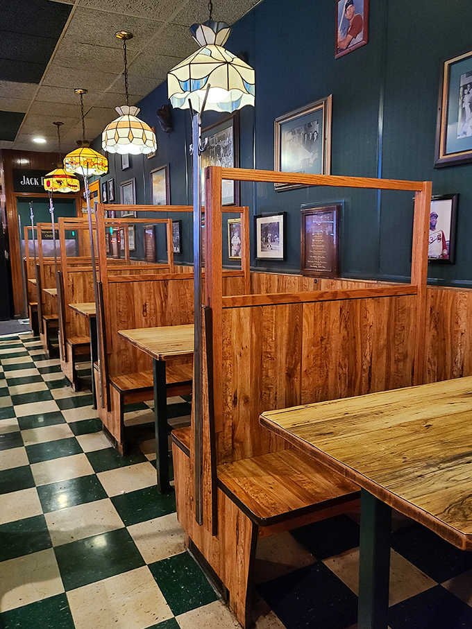 Hundreds of neckties dangle from the ceiling &ndash; silent testimonials from business travelers who learned the "no tie" policy the hard way.