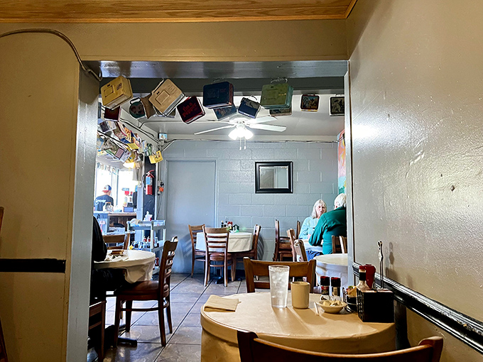 Another angle reveals more vintage lunch boxes hanging from the ceiling &ndash; a whimsical touch that gives this place its distinctive character.
