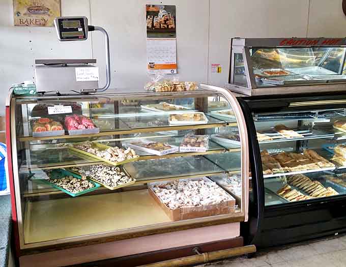 Each shelf tells a story of tradition and craft. The display cases might not be overflowing, but quality always trumps quantity here.