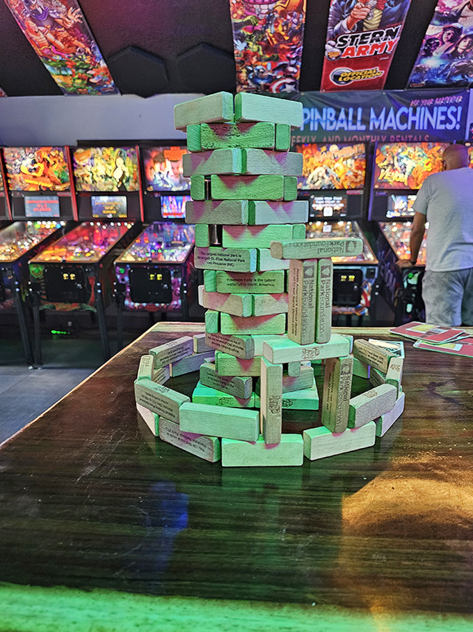 This precarious Jenga tower mirrors the delicate balance between "one more drink" and "one more game" that Reboot patrons navigate nightly.