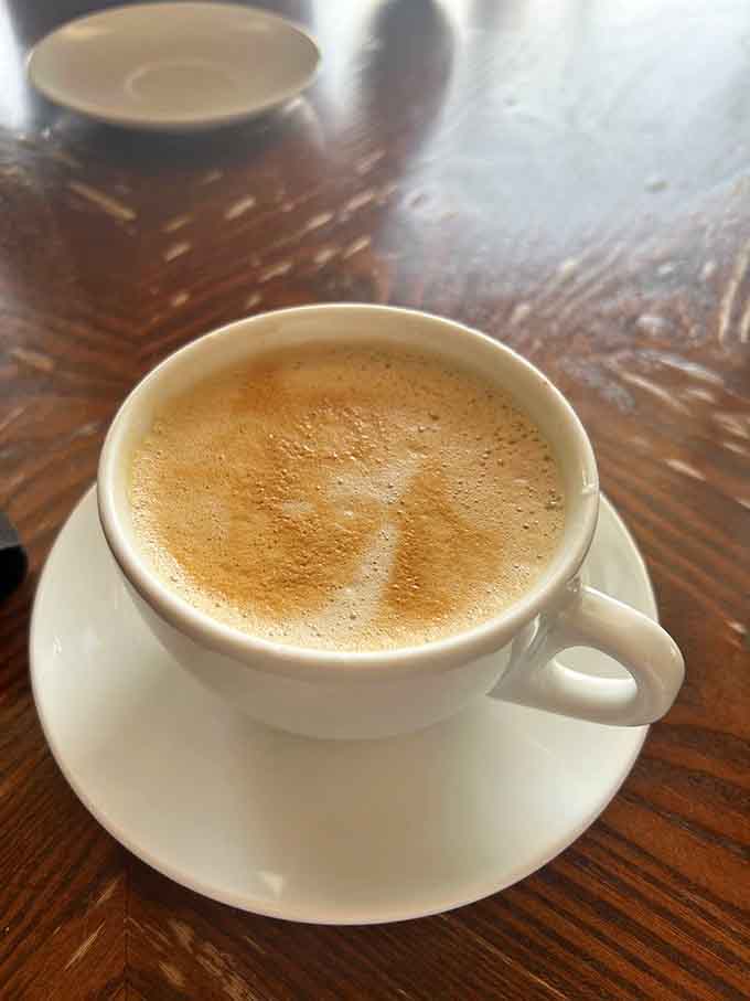 That perfect foam on a lavender honey latte shows the coffee program here is no joke.