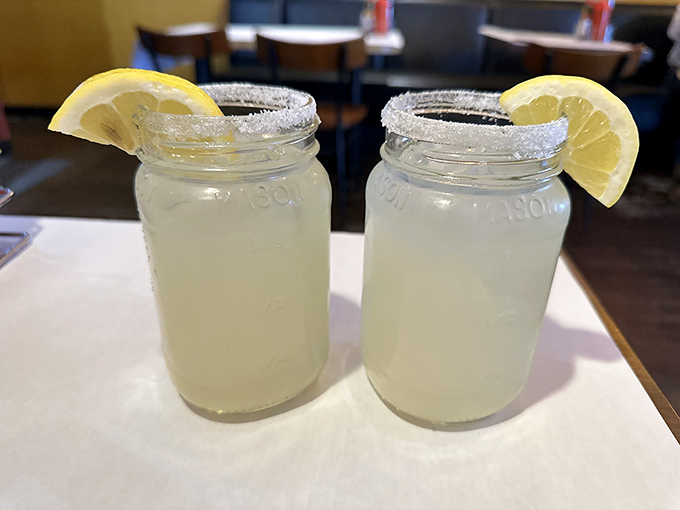 Mason jar lemonades that look like liquid sunshine with sugar rims &ndash; refreshment that works overtime to cool the Cajun heat.