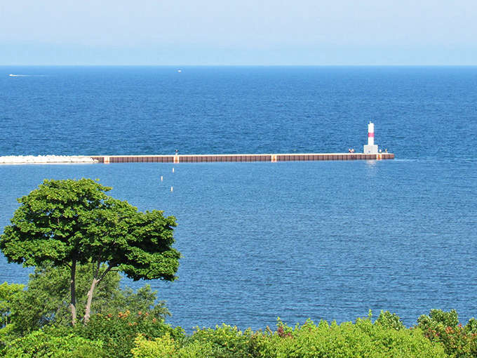 Standing sentinel at the harbor entrance, this lighthouse has guided generations of sailors safely home through calm and storm.