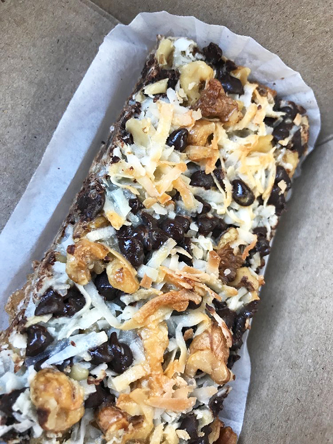 The legendary magic bar &ndash; where graham cracker crust, chocolate, coconut, and nuts unite under the binding power of sweetened condensed milk. Pure wizardry.