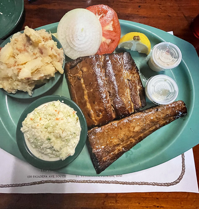 Mahi-mahi gets the Ted Peters treatment &ndash; smoky, moist perfection with all the classic accompaniments on that signature green plate.