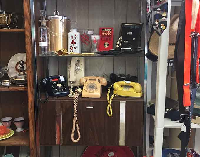 Rotary phones in harvest gold yellow, because nothing says 1970s quite like a phone that matched your kitchen appliances.