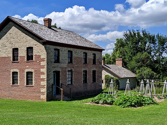 The Massart Farmstead blends sturdy brick construction with practical design, proving that Wisconsin farmers built things to last through countless harsh winters.