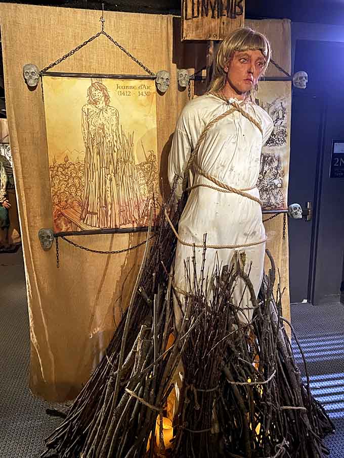 The burning of Joan of Arc represents how religious and political authorities used torture and execution to silence dissent and maintain control.