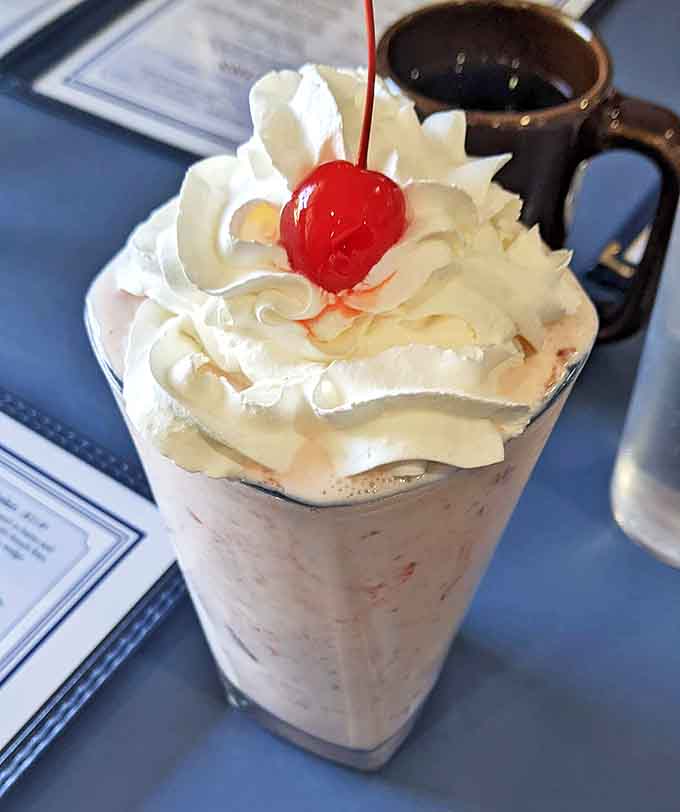 Their milkshakes don't just bring folks to the yard – they're thick enough to require serious straw strength and topped with a perfect cherry.