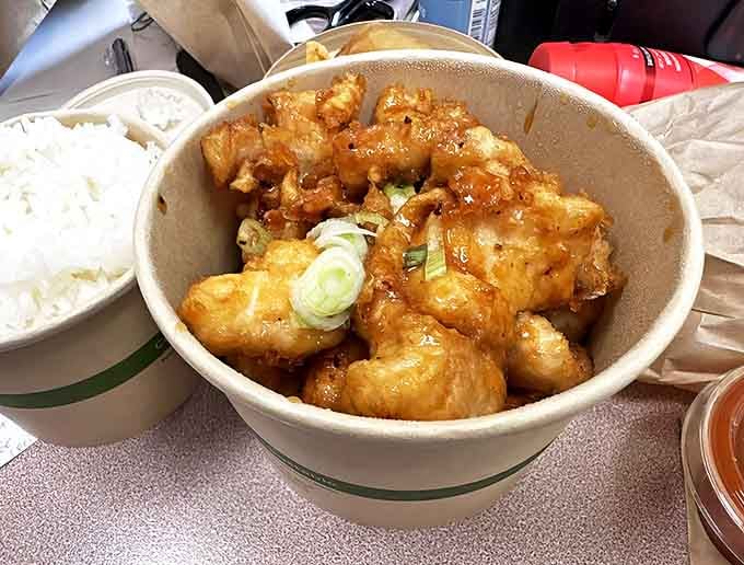 Orange chicken that actually tastes like oranges &ndash; what a concept! The sauce clings lovingly to each morsel like it can't bear to part ways.