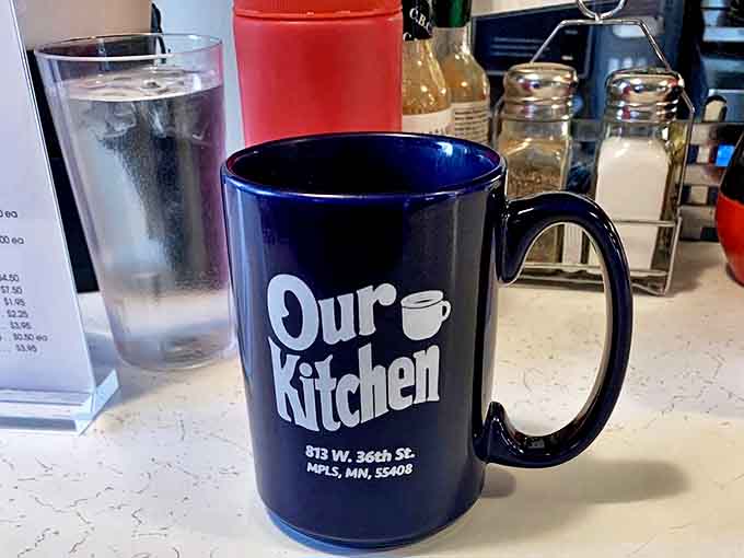 The iconic blue mug &ndash; a vessel for liquid motivation that's constantly refilled by staff with a sixth sense for empty cups.