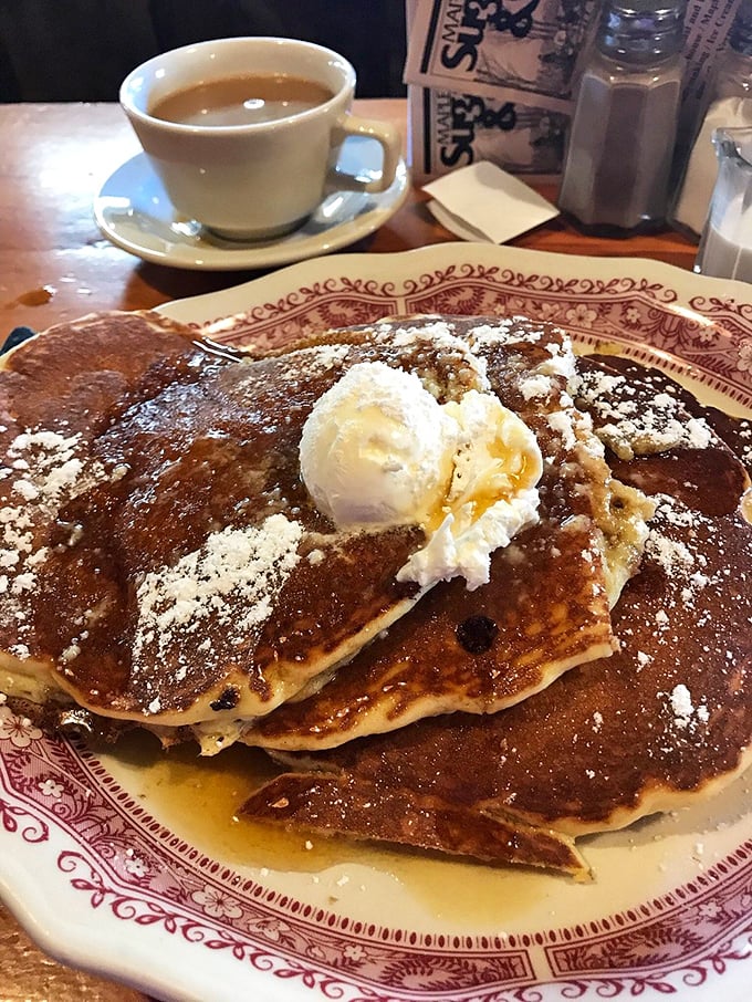 Pancakes so perfectly golden and maple-drenched they should be hanging in a breakfast museum instead of disappearing into happy stomachs.