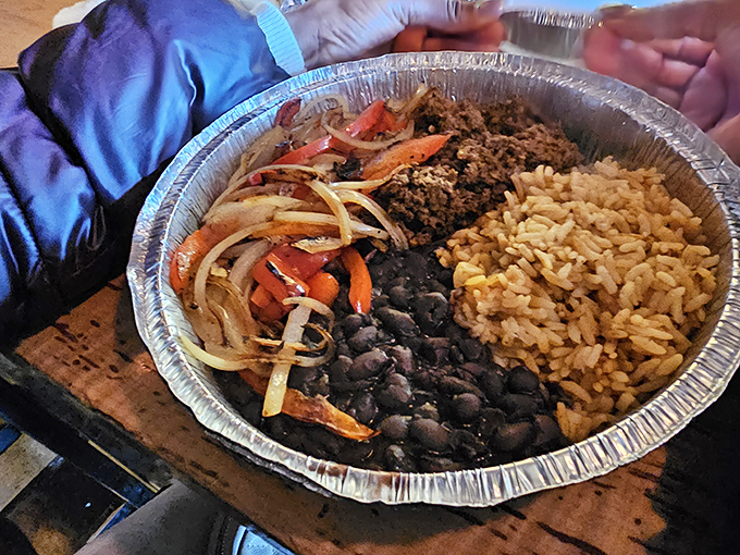 A colorful bowl featuring perfectly cooked rice, beans, and saut&eacute;ed peppers &ndash; proof that sides aren't afterthoughts but co-stars in this culinary show.
