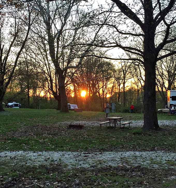 Nature's own light show as sunset paints the campground in golden hues, turning simple moments into treasured memories.