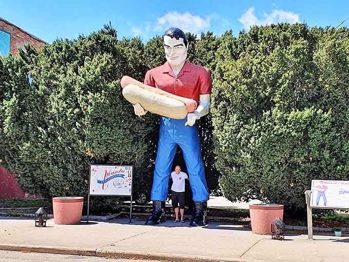 The statue provides the perfect measuring stick for visitors – "I'm exactly three hot dogs tall according to Bunyon standards!"