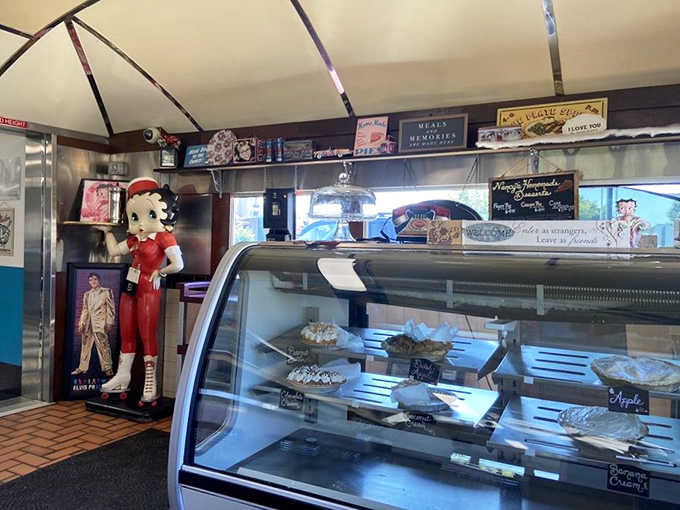 The pie case &ndash; where dreams come true and diets go to die. Each slice is a handcrafted testament to the power of butter and sugar.