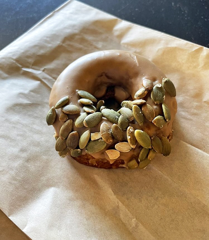 Pepitas add crunch and visual appeal to this not-too-sweet pastry that pairs perfectly with Cartel's bold coffee offerings.