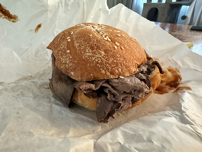 A proper roast beef sandwich on a soft roll proves that when quality ingredients meet traditional preparation, culinary magic happens without unnecessary frills.