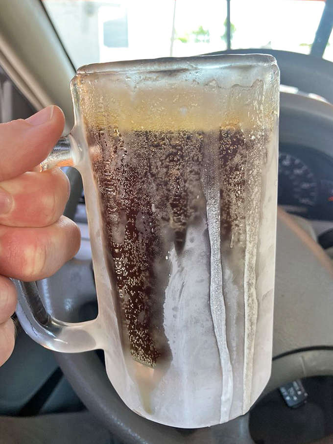 That first sip of frosty root beer creates a moment of pure joy – creamy, ice-cold perfection in a mug substantial enough to respect its contents.