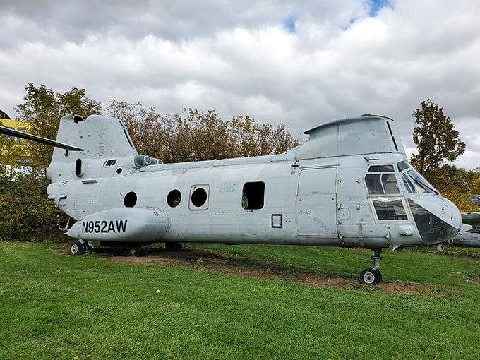 The museum's collection includes this vintage military transport helicopter, its weathered exterior telling tales of missions long completed.