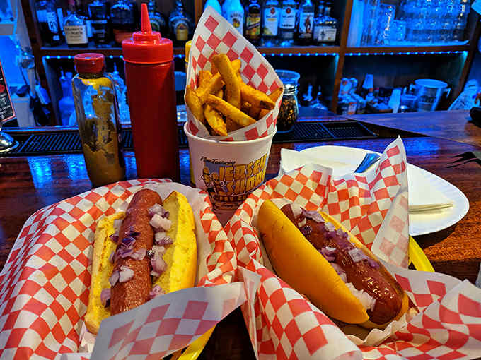Hot dogs dressed the way the arcade gods intended – simple, satisfying fuel for your next high-score attempt.