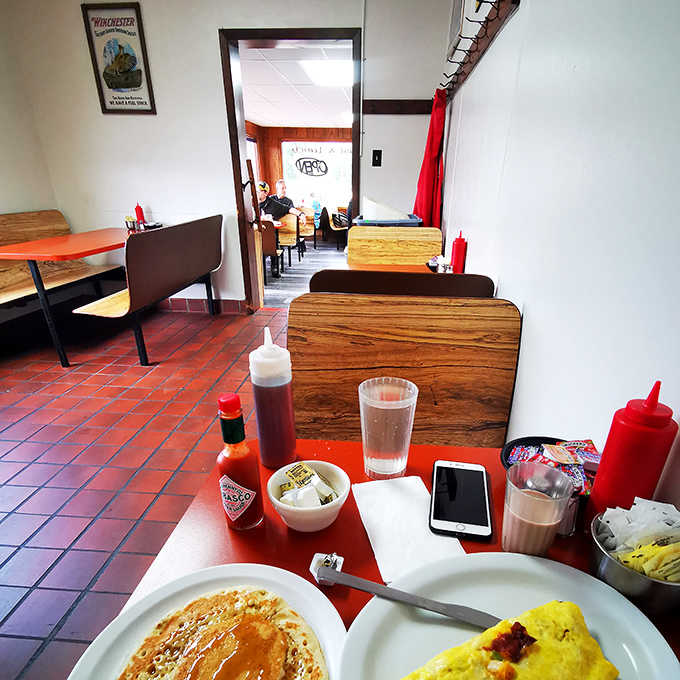 The dining room's wood-paneled charm creates an atmosphere where time slows down just enough to savor every bite.