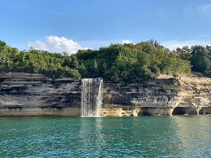 Spray Falls plunges directly into Lake Superior, a sight best appreciated from the water where you can feel its refreshing mist.
