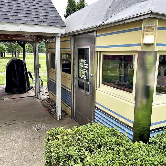 The side entrance reveals the diner's modest operating schedule – a reminder that the best things in life aren't available 24/7, and that's what makes them special.
