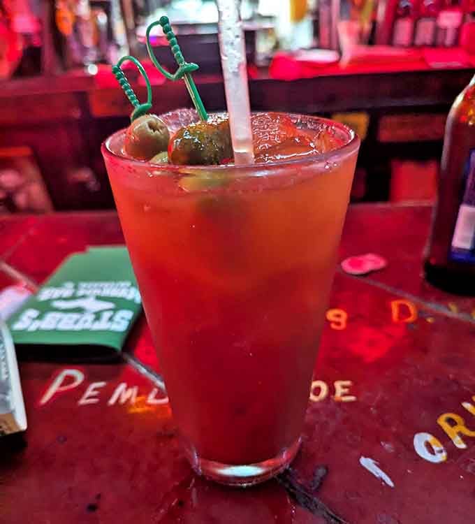 The legendary Bloody Mary arrives garnished with olives on tiny swords &ndash; a civilized touch in a wonderfully uncivilized setting.