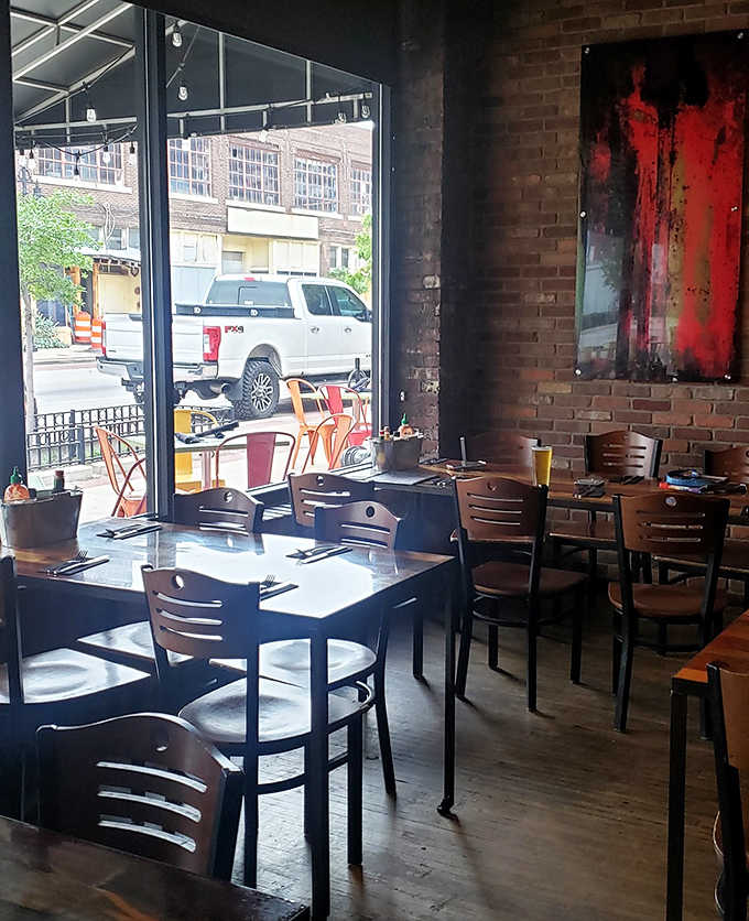 Another angle reveals the thoughtful layout and warm ambiance that makes every seat feel like a good seat in this welcoming space.