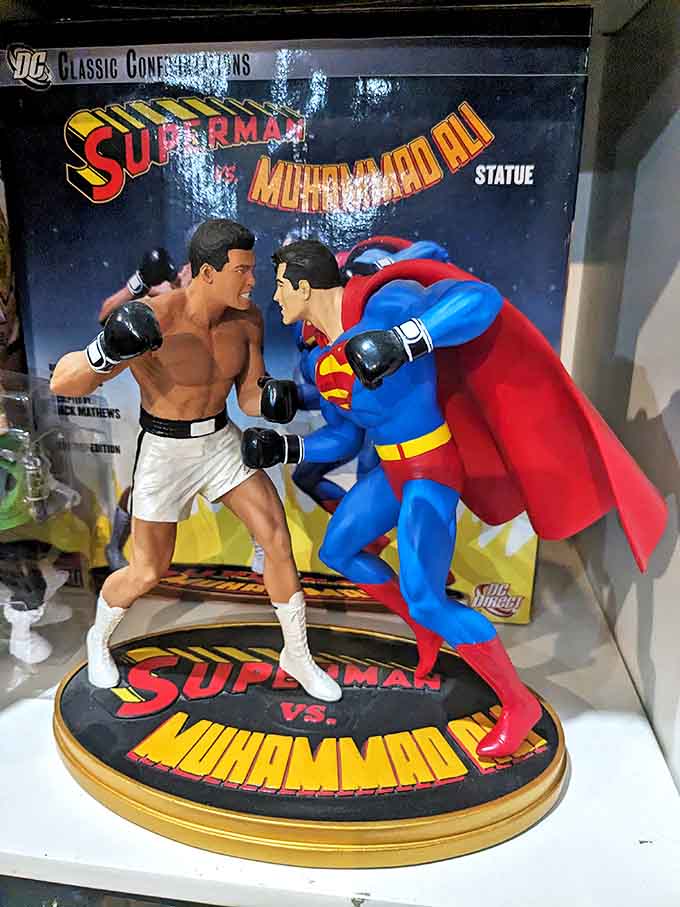 The Superman versus Muhammad Ali statue captures the most unexpected crossover in comic book history, when the greatest boxer met the Man of Steel for a fight that somehow made perfect sense.
