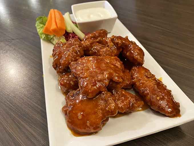 These glossy sweet chili wings glisten with sauce, offering the perfect balance of sweet and heat that'll have you licking your fingers.