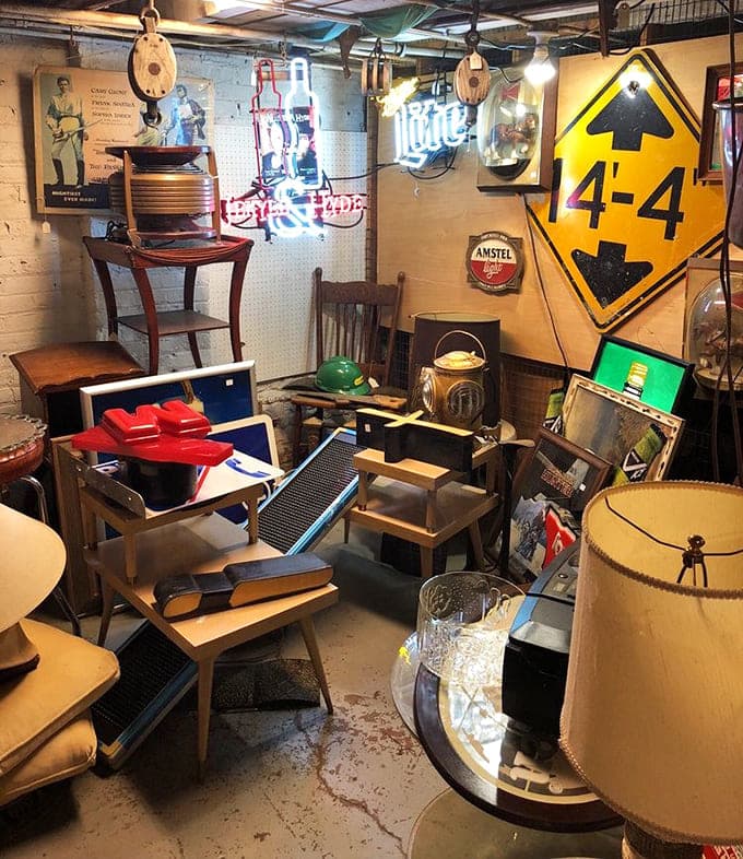 Mid-century furniture arranged like a vintage showroom, where every piece whispers "take me home, I'll make you look cultured."
