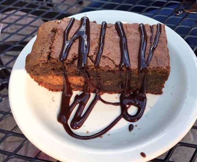 This peanut butter stuffed brownie with chocolate drizzle is the sweet ending your burger adventure deserves, possibly requires.