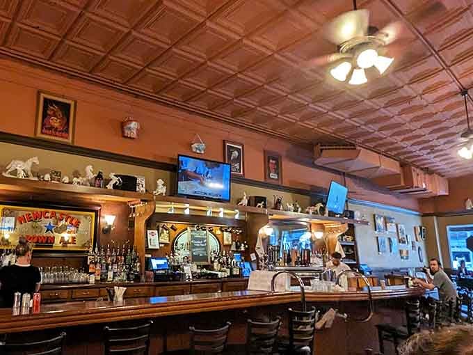 The bar area showcases craft beer taps and polished wood, creating the perfect spot for pre-dinner drinks or post-work unwinding.