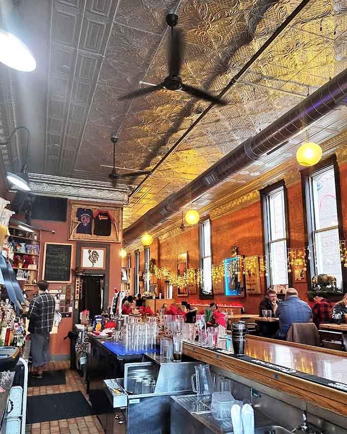 The restaurant's high ceilings, warm lighting, and bustling energy create the perfect backdrop for memorable meals and laughter-filled conversations.