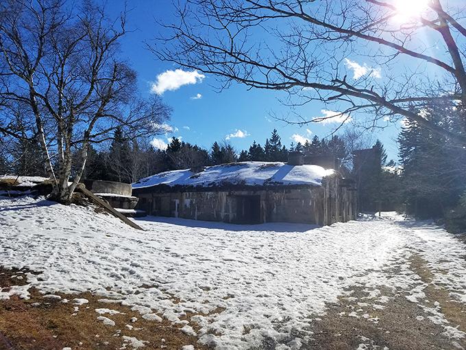 Winter transforms Fort Baldwin into a snow-draped monument, the white blanket softening harsh concrete edges while highlighting architectural details.