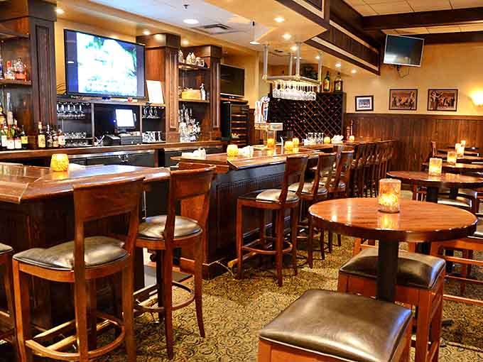 Dark wood and ambient lighting create a bar area where even a simple beer feels like a special occasion worth savoring.