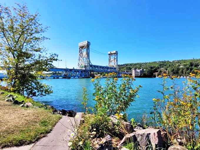 The engineering marvel of Portage Lake Lift Bridge connects Houghton to Hancock across the water, serving as both functional passage and community icon.