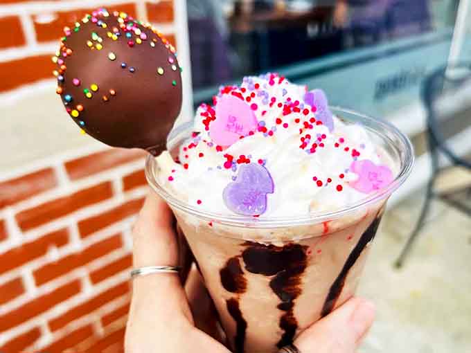This isn't just dessert in a cup &ndash; it's a carnival of chocolate, cream, and sprinkles that makes adulting temporarily optional.