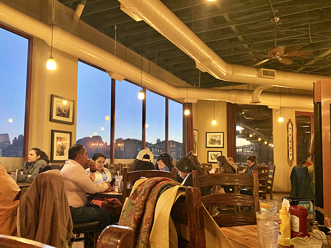 As evening falls, diners settle in for a memorable meal with views that rival the food for attention. Those windows frame Sedona's beauty like living paintings.