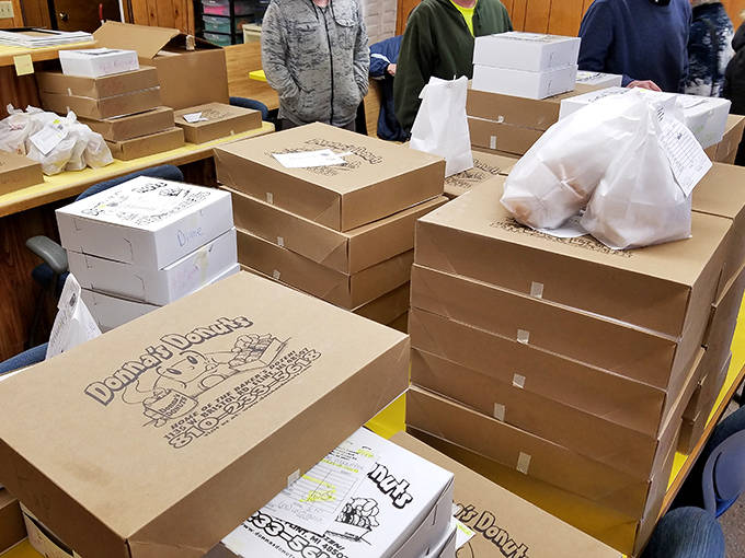 Stacks of donut boxes await their precious cargo &ndash; each destined to make someone's day significantly better than it was before.