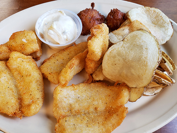 Golden-fried fish and perfectly cooked potatoes showcase the kitchen's talent beyond their legendary steaks.