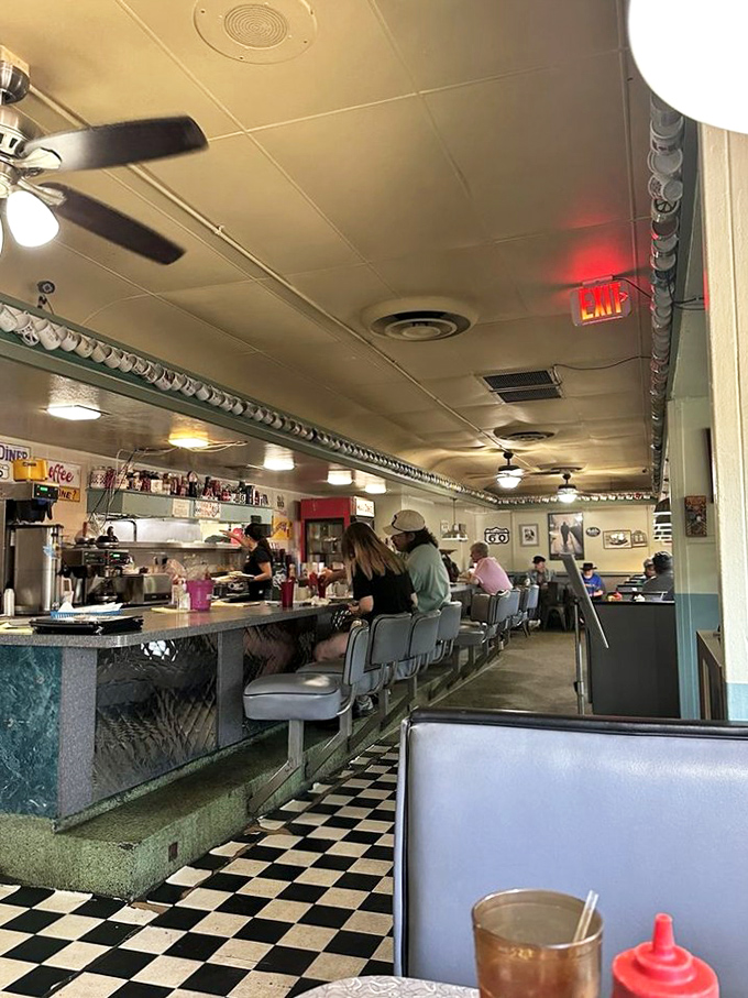 The diner's interior buzzes with the comfortable energy of a place where regulars and newcomers are treated with equal warmth.