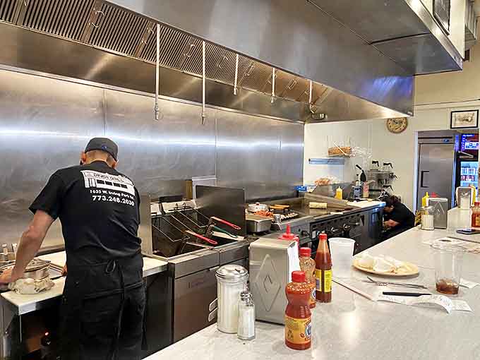 Behind the scenes magic: skilled cooks transform simple ingredients into memorable meals with practiced precision.