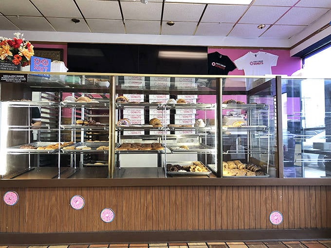 Behind this glass lies happiness in various shapes and glazes &ndash; choose your own adventure in donut form.
