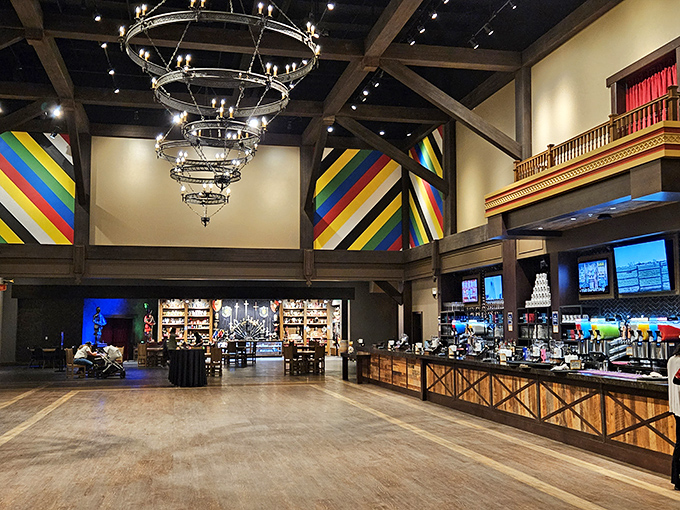 The castle's grand lobby area welcomes modern-day visitors with soaring ceilings, wooden beams, and a gift shop fit for aspiring royalty.