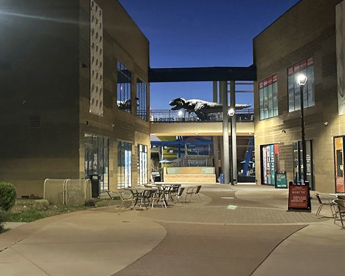 Even the outdoor spaces continue the theme of visual trickery, with architectural elements designed to play with perspective.