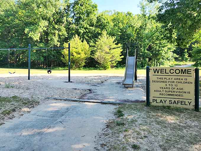 Simple pleasures await at the playground where kids can slide and swing while parents enjoy a moment's peace.