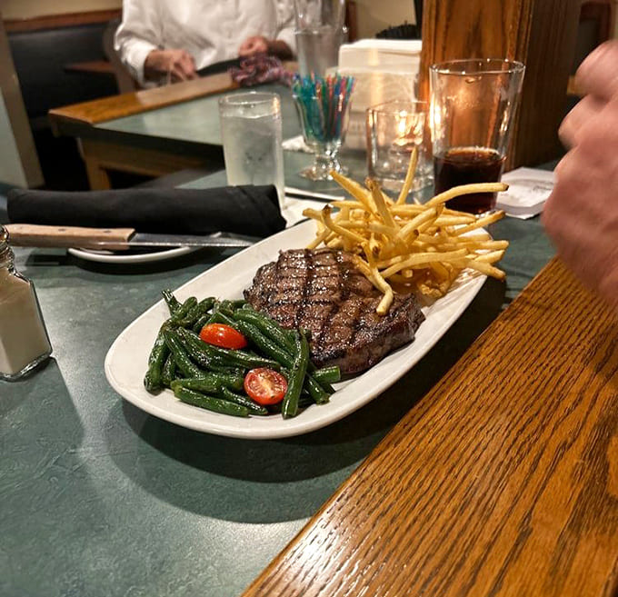 The cr&egrave;me br&ucirc;l&eacute;e arrives with a perfectly torched top that cracks like thin ice, revealing silky custard beneath.